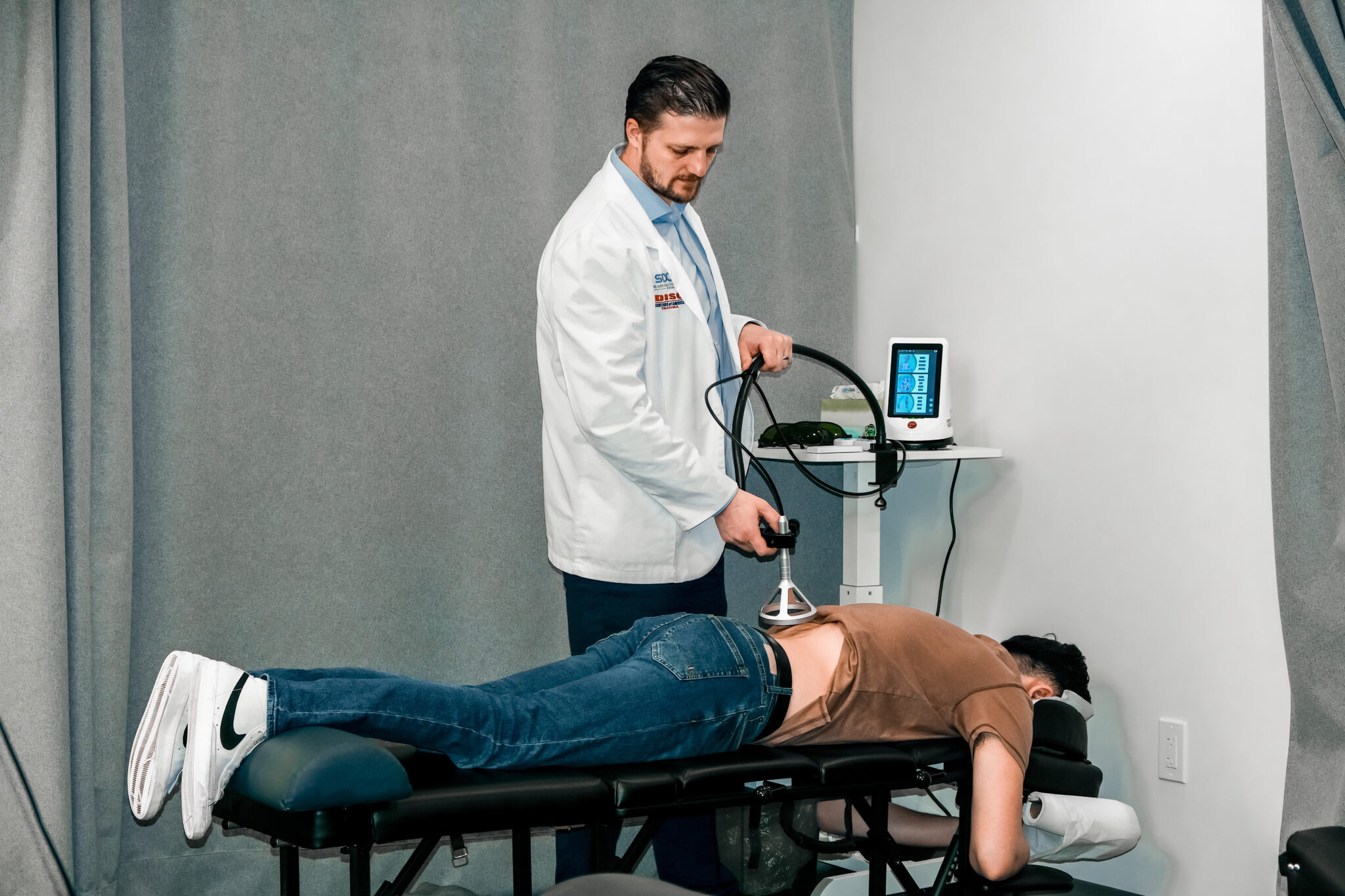 How Does Laser Therapy Work? – Spine and Disc Center of Washington